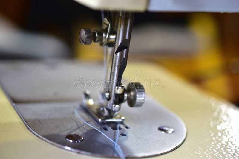 Sewing Machine and Work Surface with Needle and Thread Stock Image ...