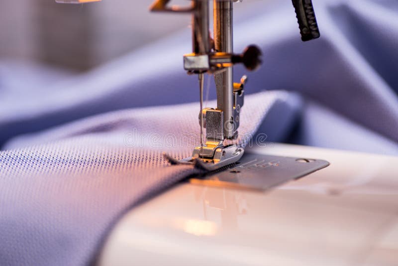 Sewing machine in work stock image. Image of industry - 93121083