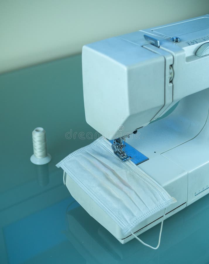 Sewing masks for viruses stock photo. Image of fabric - 199438732