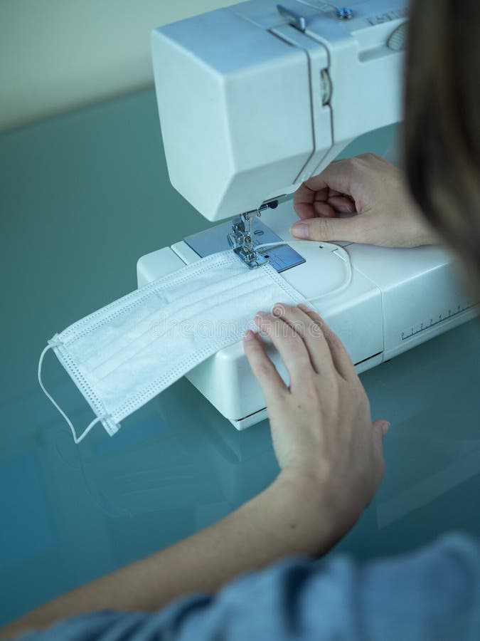 Sewing masks for viruses editorial photo. Image of corona - 199438846