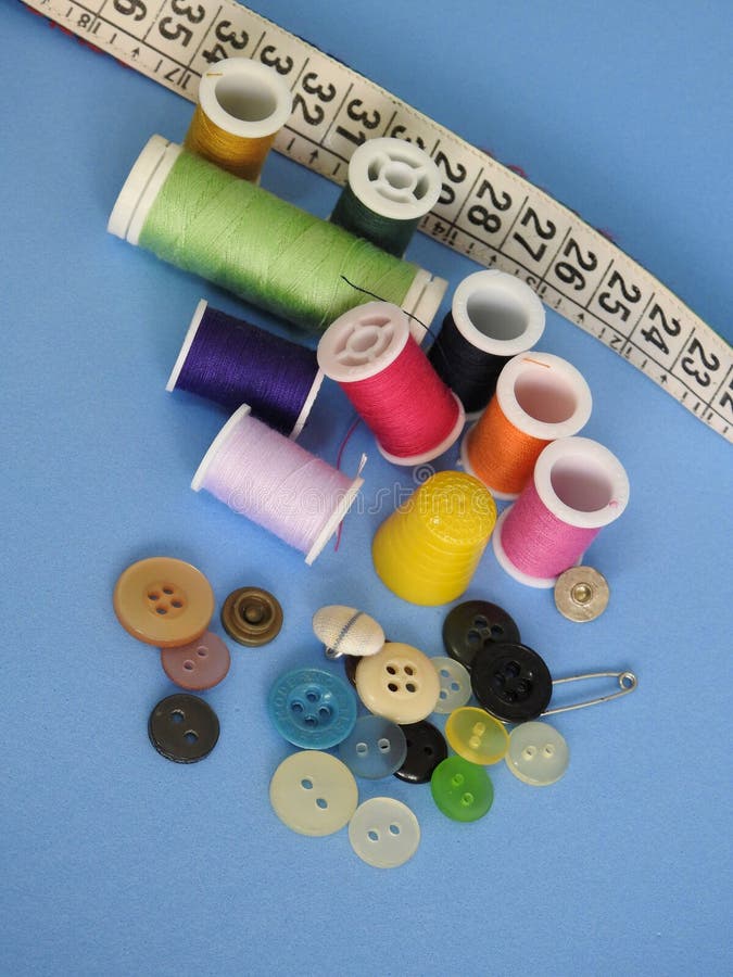 Sewing Materials Arranged on a Blue Surface Stock Photo - Image of ...