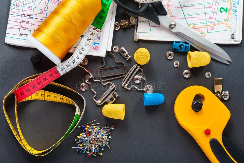 Sewing Measuring Tape with Sewing Patterns Stock Image - Image of ...