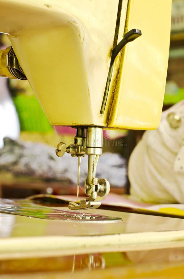 Sewing mechine three stock image. Image of fabric, seamstress - 58644607