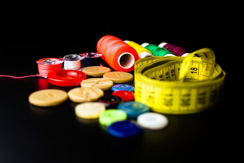 Sewing Multi-colored Threads, Buttons and Centimeters Stock Photo ...