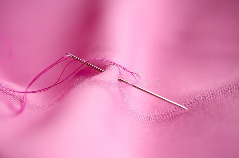 Sewing Needle with Thread Stuck into Pink Fabric Stock Image - Image of ...