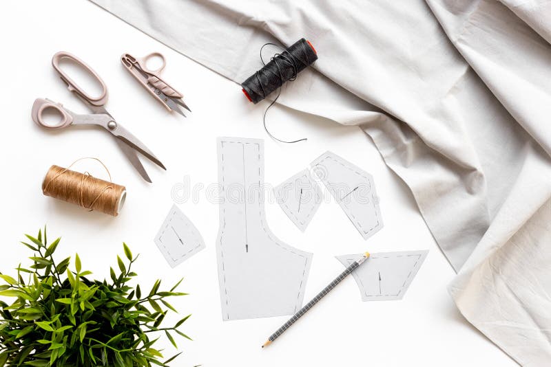 Sewing Patterns with Fabric - Fashion Designer Table with Tailor Tools ...