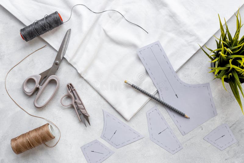 Sewing Patterns with Fabric - Fashion Designer Table with Tailor Tools ...