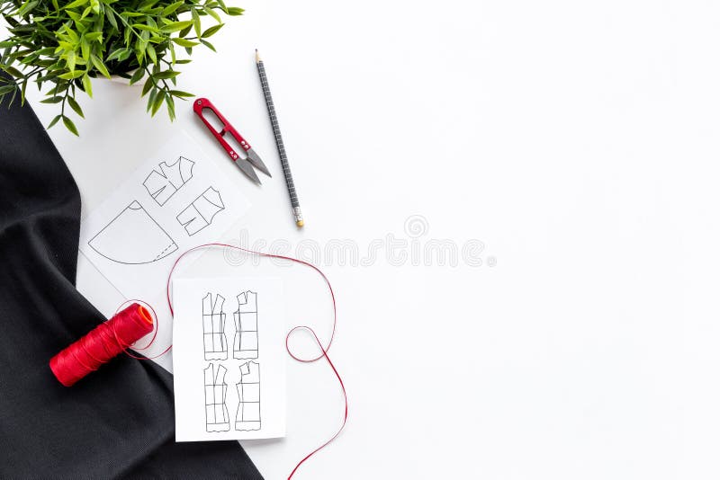 Sewing Patterns with Fabric - Fashion Designer Table with Tailor Tools ...