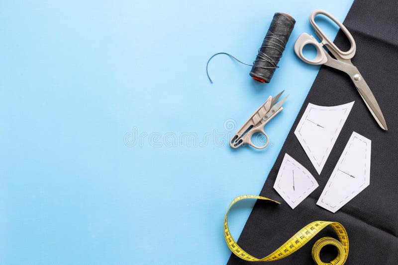 Sewing Patterns with Fabric - Fashion Designer Table with Tailor Tools ...