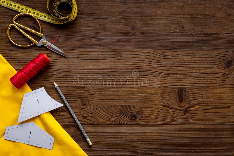 Sewing Patterns with Fabric - Fashion Designer Table with Tailor Tools ...