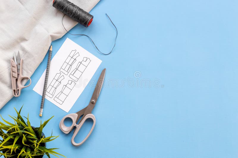 Sewing Patterns with Fabric - Fashion Designer Table with Tailor Tools ...