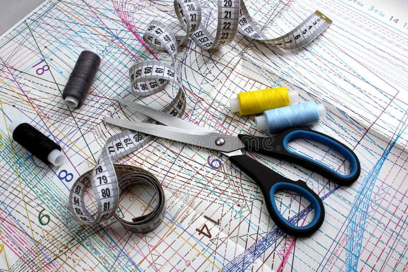 On Sewing Patterns are Scissors, Thread and Tape Measure Stock Image ...