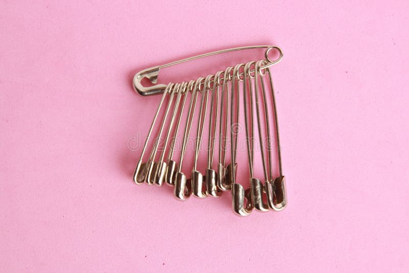 Set of Sewing Pins on a Green Surface Stock Image - Image of design ...