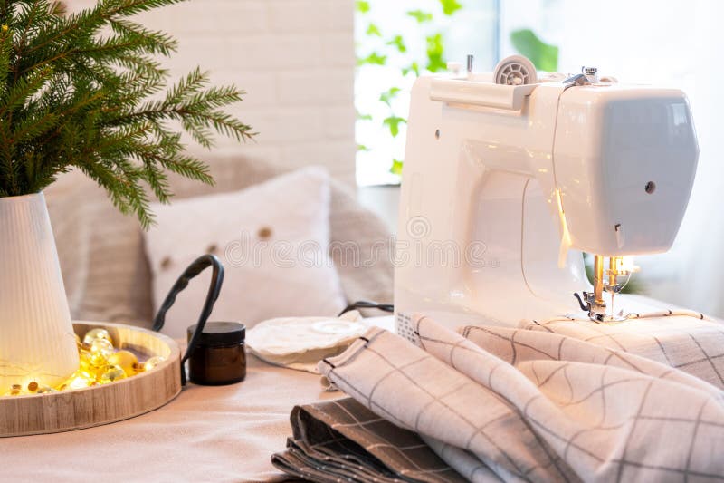 Sewing Process on a Sewing Machine, a Needle with a Thread and a Holder ...