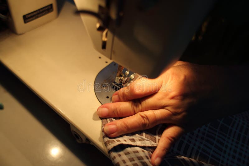 Sewing process stock image. Image of fabric, holding - 50649071