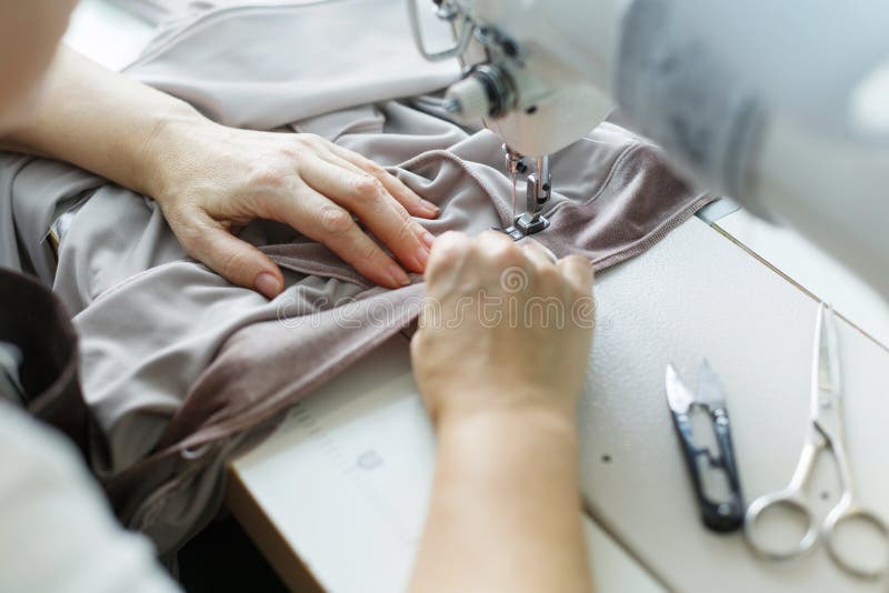 Sewing process stock image. Image of fabric, holding - 50649071