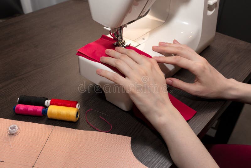 Sewing Process on a Sewing Machine. Sewing Accessories Threads, Graph ...