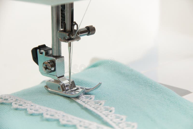 The Sewing on the Sewing Machine Turquoise Fabric Stock Image - Image ...