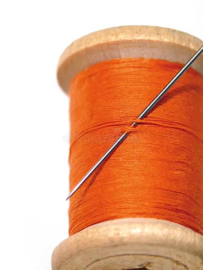 Sewing Spool With A Needle. A Sewing Needle Stock Photo - Image of ...