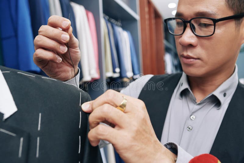 Tailor sewing clothes stock photo. Image of people, atelier - 148952112