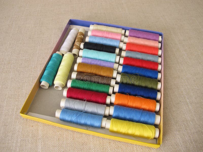 Sewing thread in a box stock photo. Image of thread - 249924468