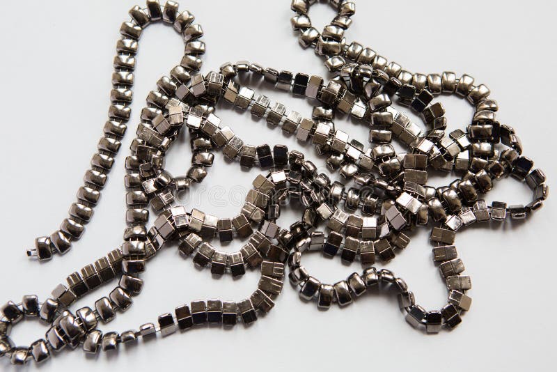 Sewing Thread with Silver Stones Stock Photo - Image of chain ...