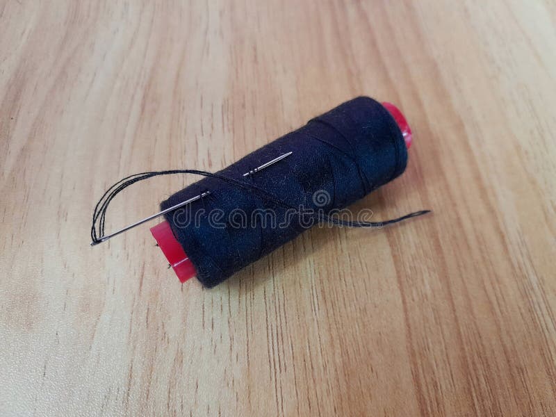 Sewing Thread on Wooden Table Stock Photo - Image of organ, wool: 319913428