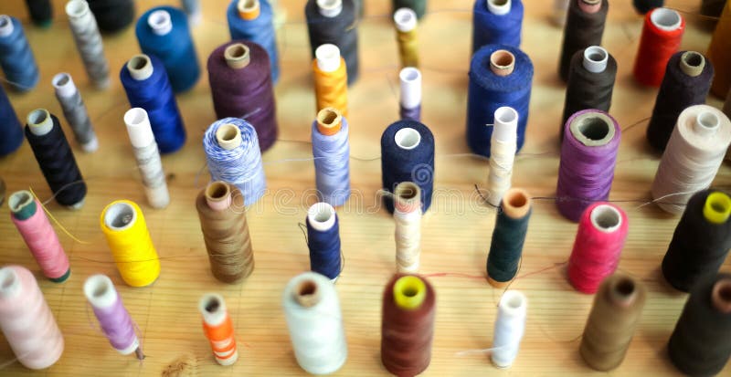 Sewing Threads Displayed on Wooden Board Stock Image - Image of fiber ...