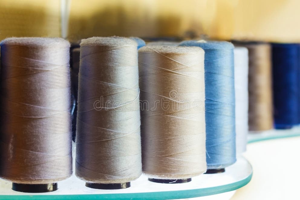 Sewing Threads in Assortment Close-up on the Shelf. Stock Photo - Image ...