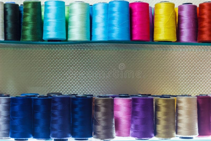 Sewing Threads in Assortment Close-up on the Shelf. Stock Photo - Image ...