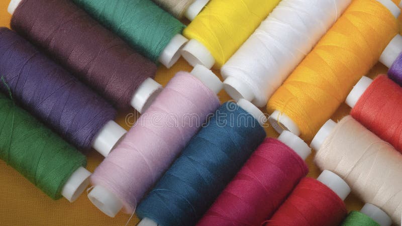 Sewing Threads of Different Colors Arranged in a Sequence Order. Close ...