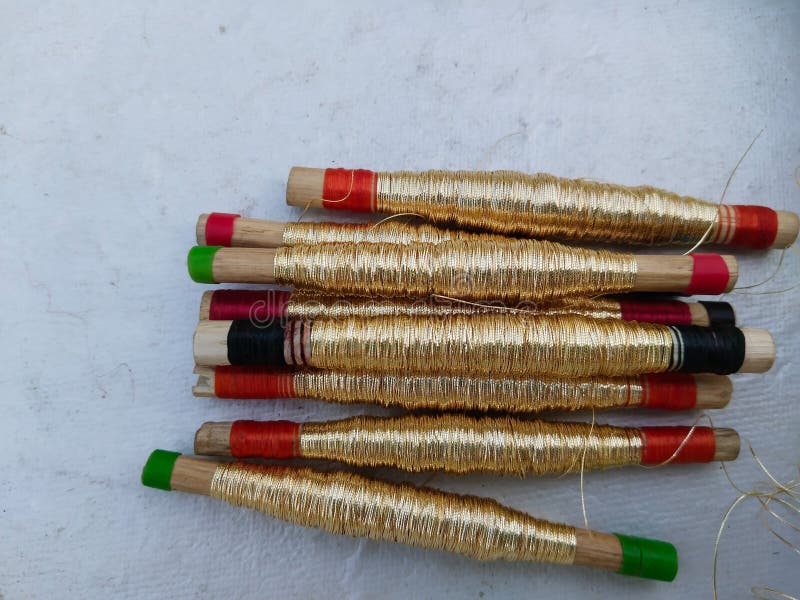 Sewing Threads Golden Color Closeup Stock Photo - Image of muga, silky ...