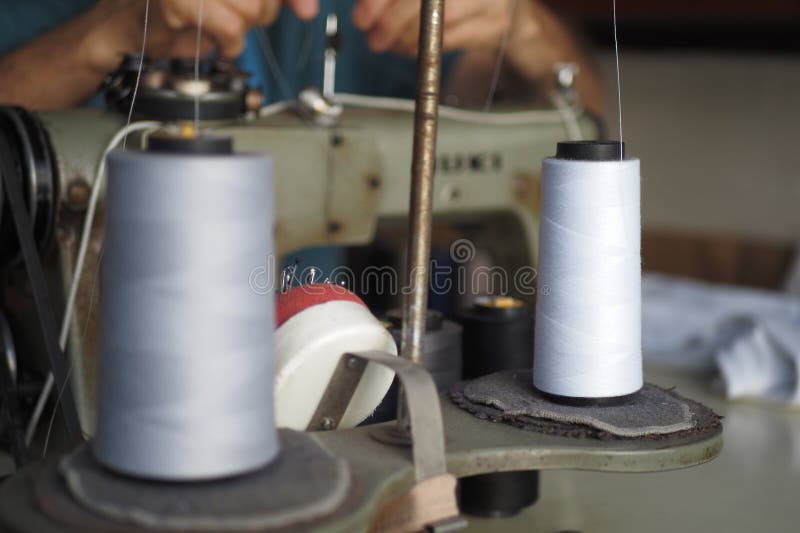 Sewing Threads on a Sewing Machine Stock Photo - Image of white, cotton ...