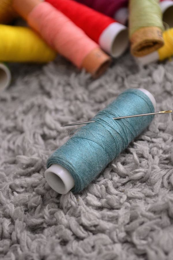 Sewing Threads and a Needle Stock Photo - Image of knitting, thread ...