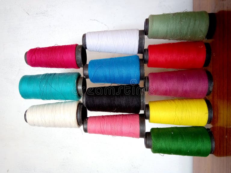Sewing Threads, Stitching Threads, Tailoring Threads on Table Stock ...