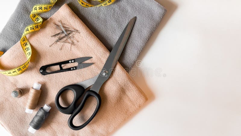Sewing Tools and Fabrics. Scissors, Thread, Measuring Tape, Needles ...