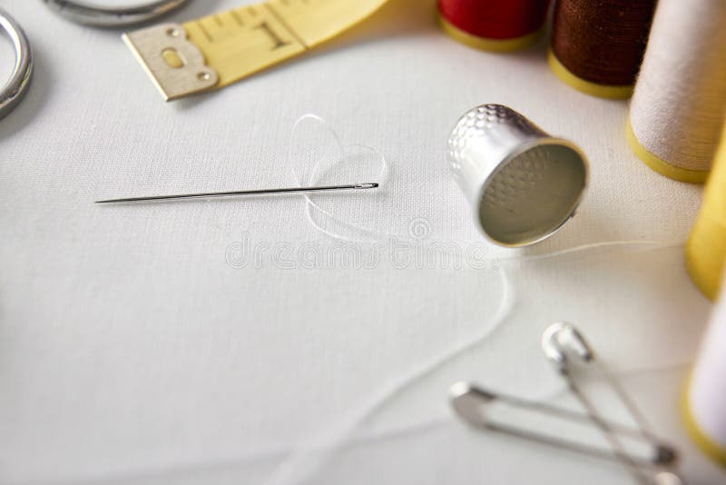 Sewing Tools on White Fabric Background Elevated View Stock Image ...
