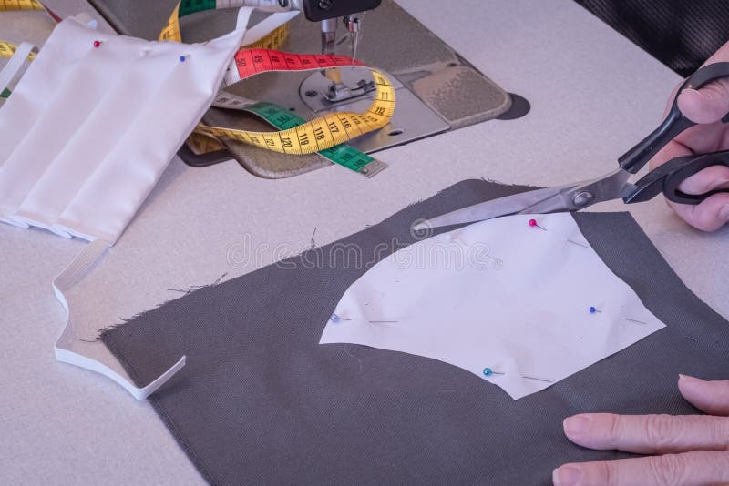 Sewing Work by a Professional Seamstress with a Sewing Pattern. Stock ...