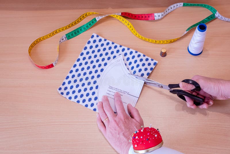 Sewing Work by a Professional Seamstress with a Sewing Pattern. Stock ...
