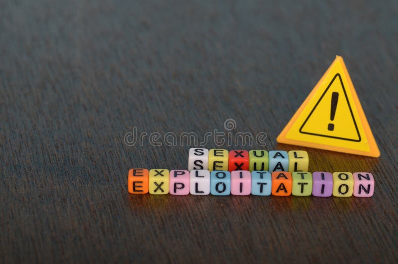 Sexual Exploitation Warning Concept: Alphabet Beads and Caution Sign ...