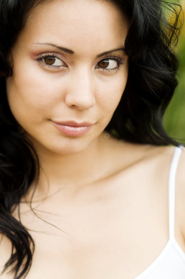 Alluring Woman Sitting on Red Sofa Stock Photo - Image of attractive ...