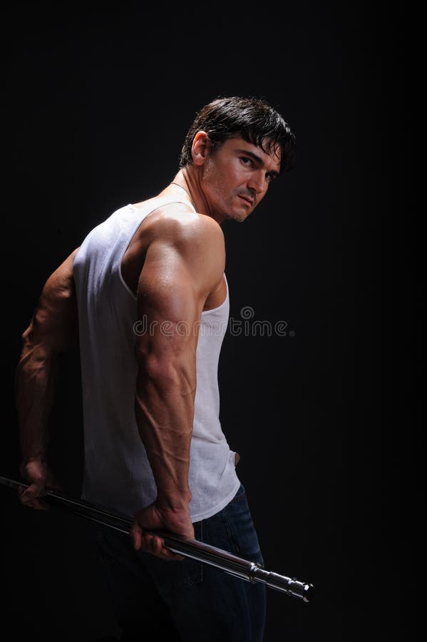 The Biker Strikes a Unique Pose Stock Image - Image of burley, brazen ...