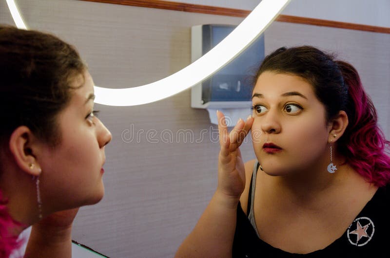 Chubby Woman Putting on Some Makeup Stock Photo - Image of lipgloss ...