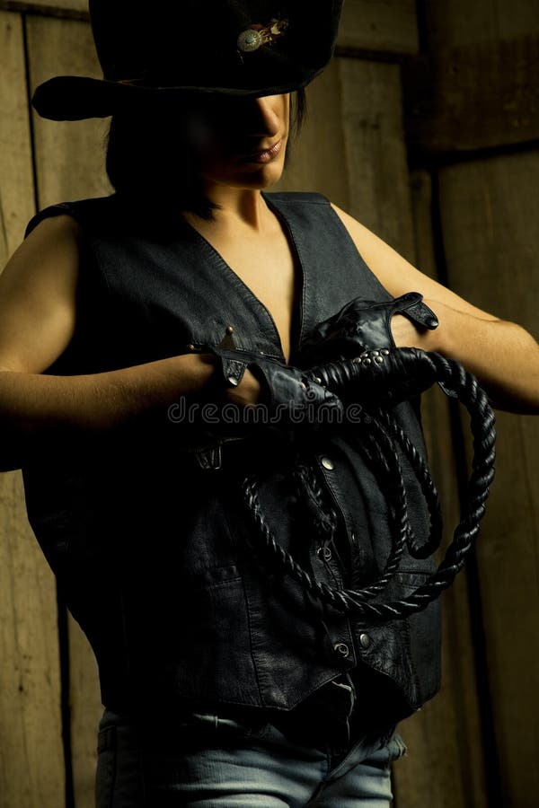 Cowboy With Black Leather Flogging Whip Stock Image - Image of ...