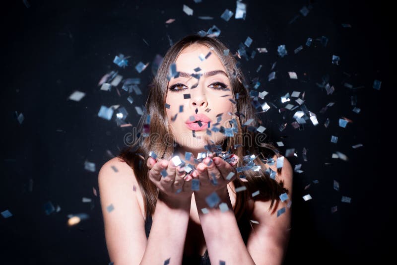 Girl Blowing Confetti Portrait Of Beautiful Young Woman On Birthday