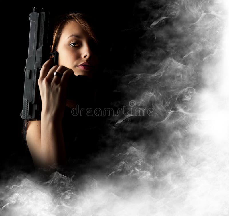 Girl holding gun stock photo. Image of shot, kill, dangerous - 23721372