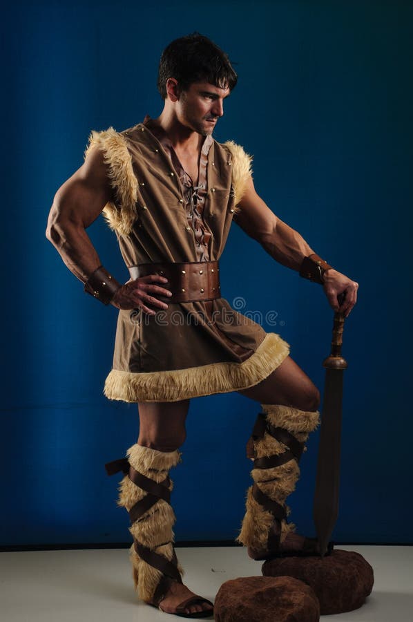 The Gladiator Strikes a Unique Pose Stock Photo - Image of dark ...