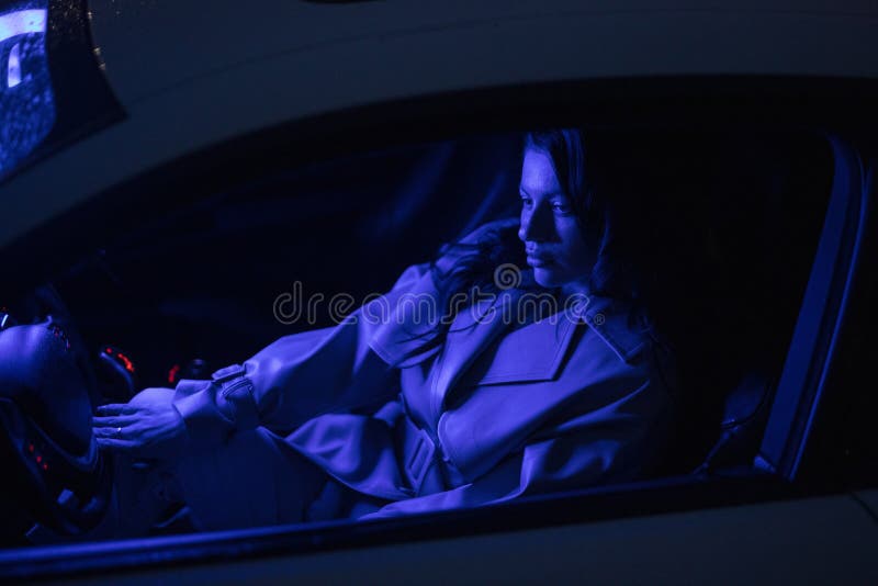 Lady Posing in a Car in Blue Light Stock Image - Image of portrait ...
