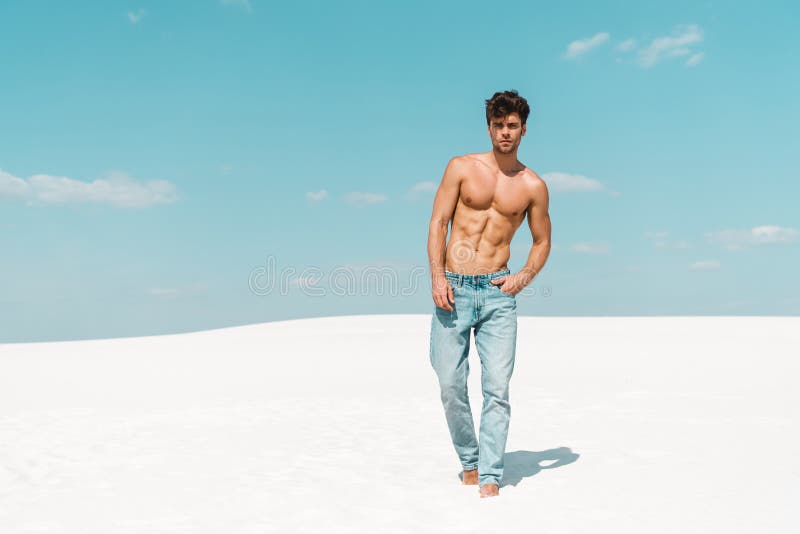 Man with Muscular Torso in Swim Shorts with Coconut Drink on Sandy ...