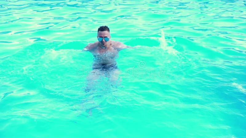Man in a pool stock footage. Video of water, pool, swim - 118825498